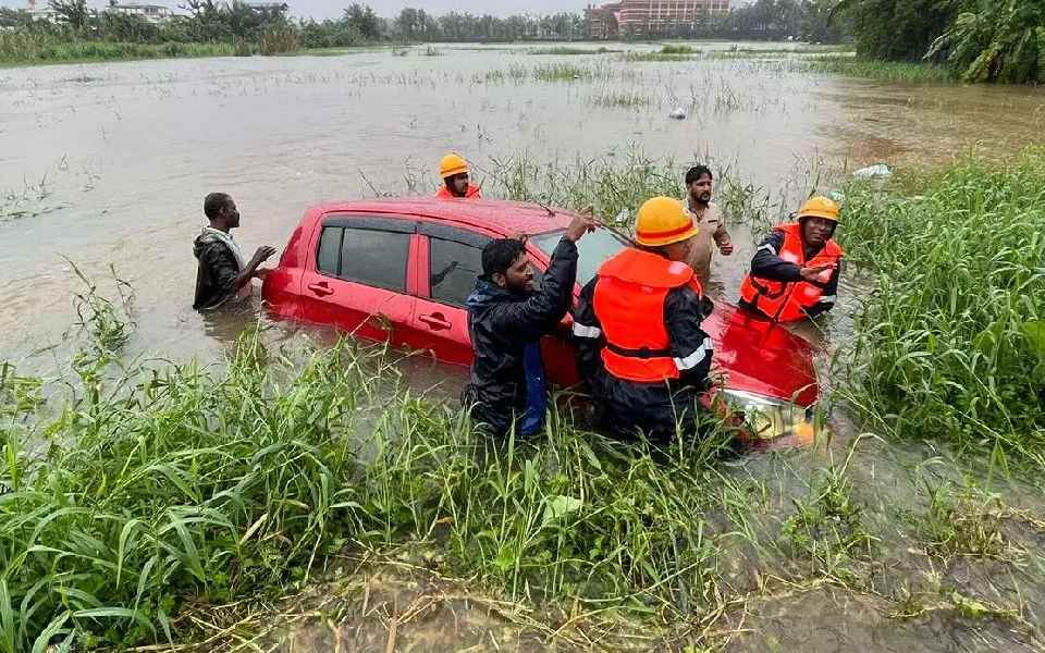 Three passengers escape unhurt after car washes away in Udupi flood